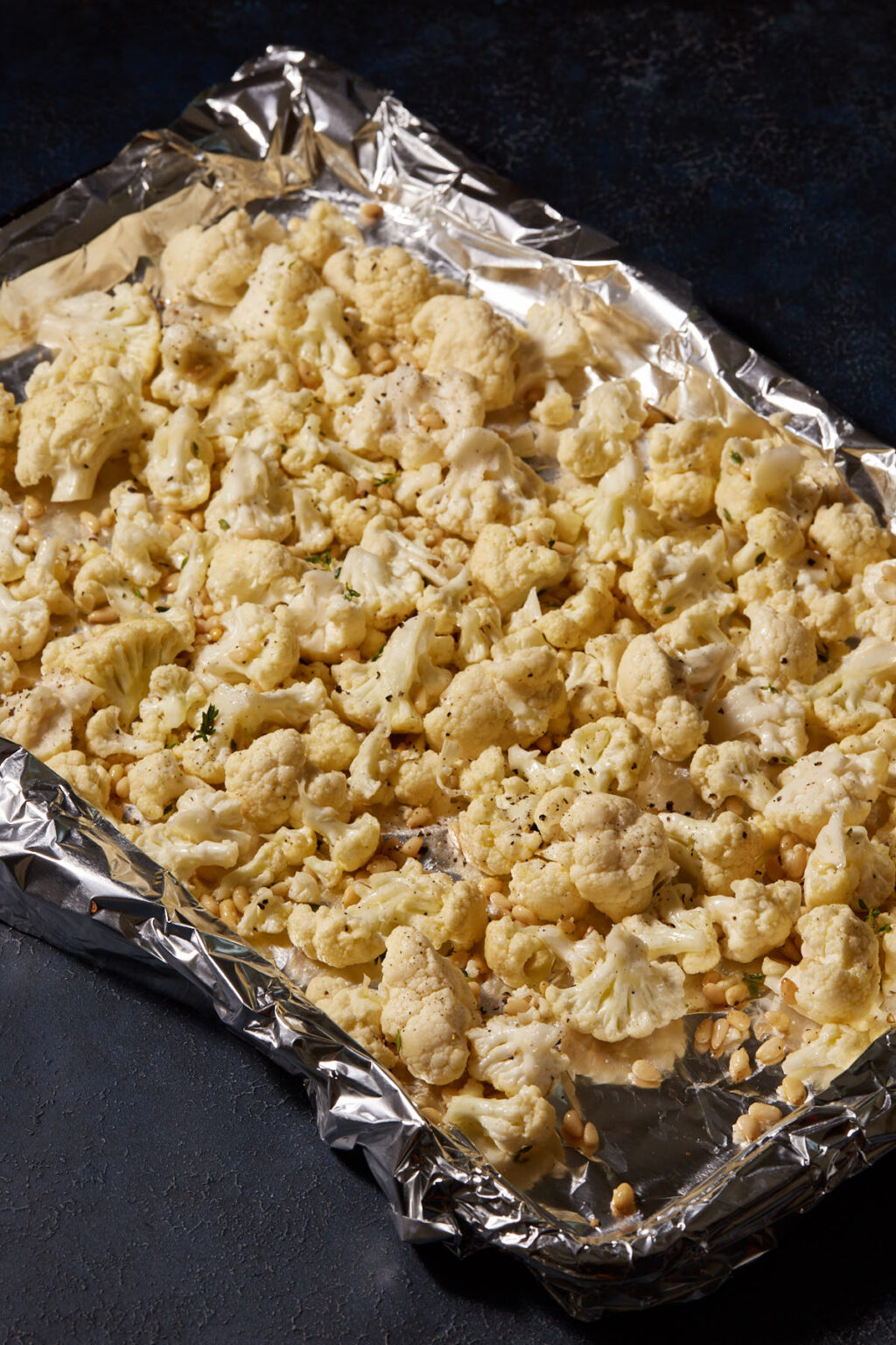 Roasted Cauliflower with Garlic & Raisins - Butter & Baggage