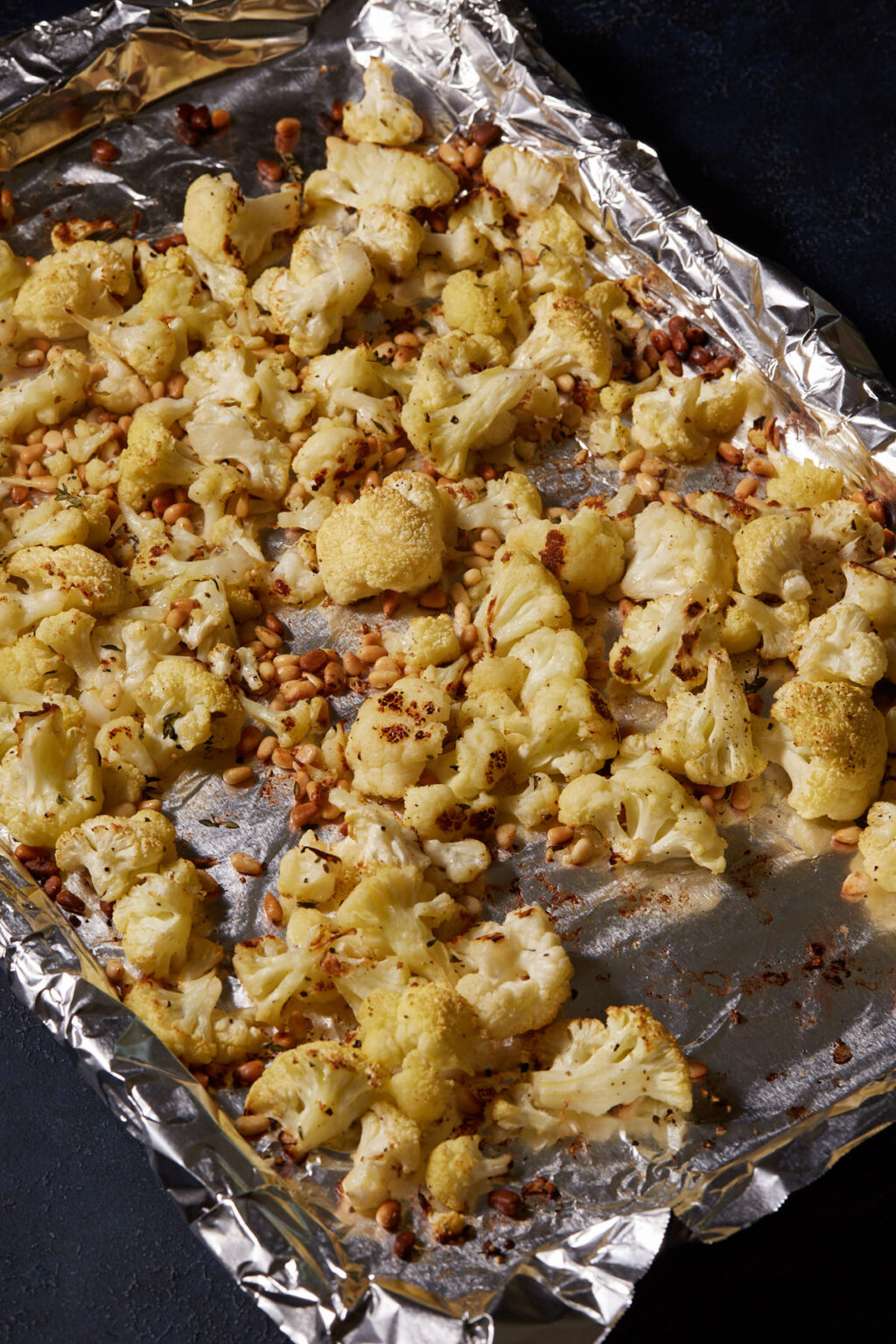 Roasted Cauliflower with Garlic & Raisins - Butter & Baggage