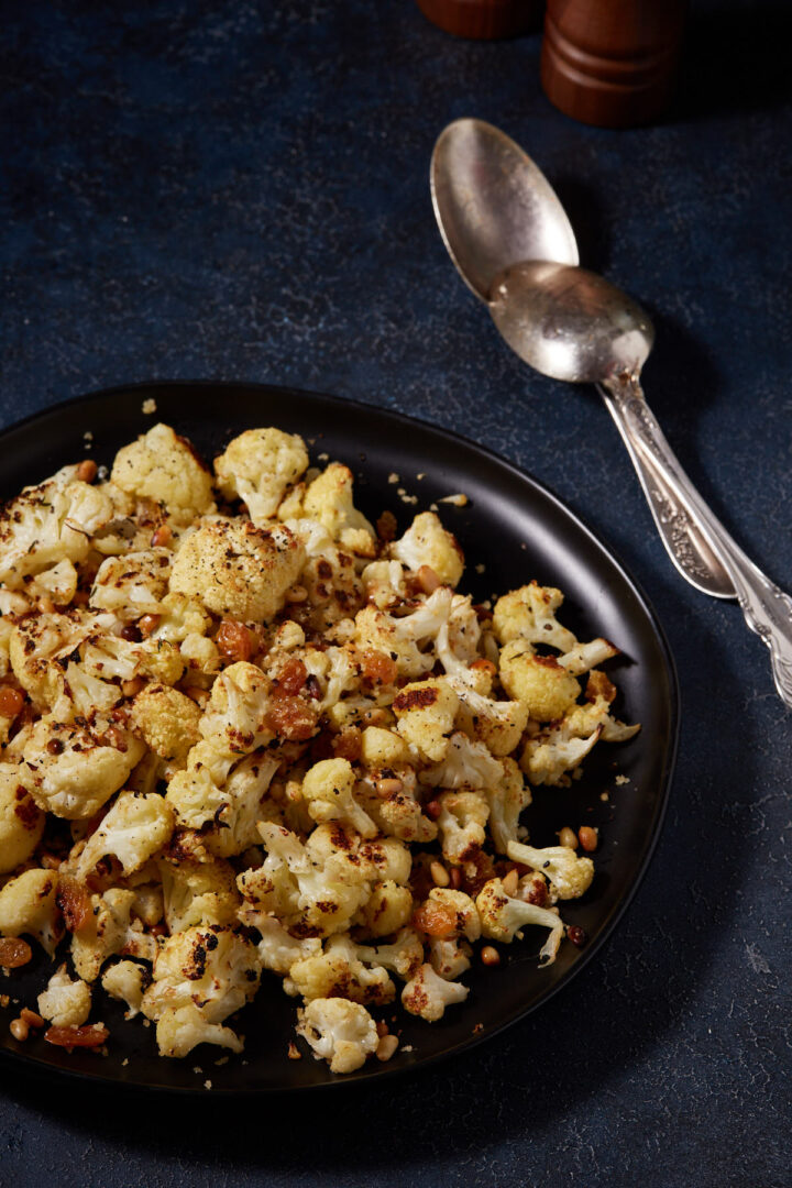 Roasted Cauliflower with Garlic & Raisins - Butter & Baggage