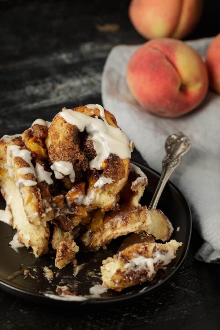 Peach Cinnamon Rolls with Bourbon Glaze - Butter & Baggage