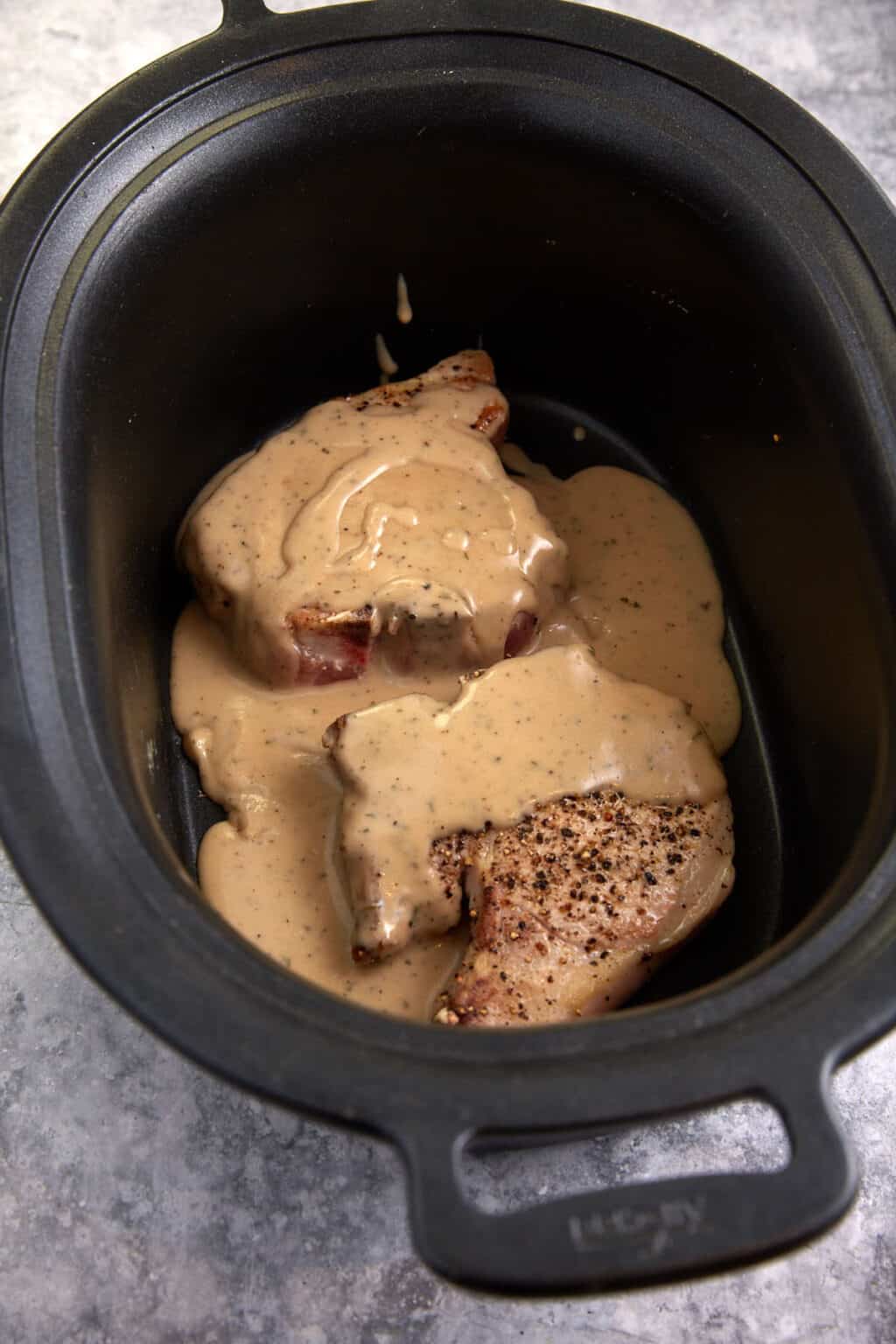 Slow Cooker Ranch Pork Chops with Gravy - Butter & Baggage