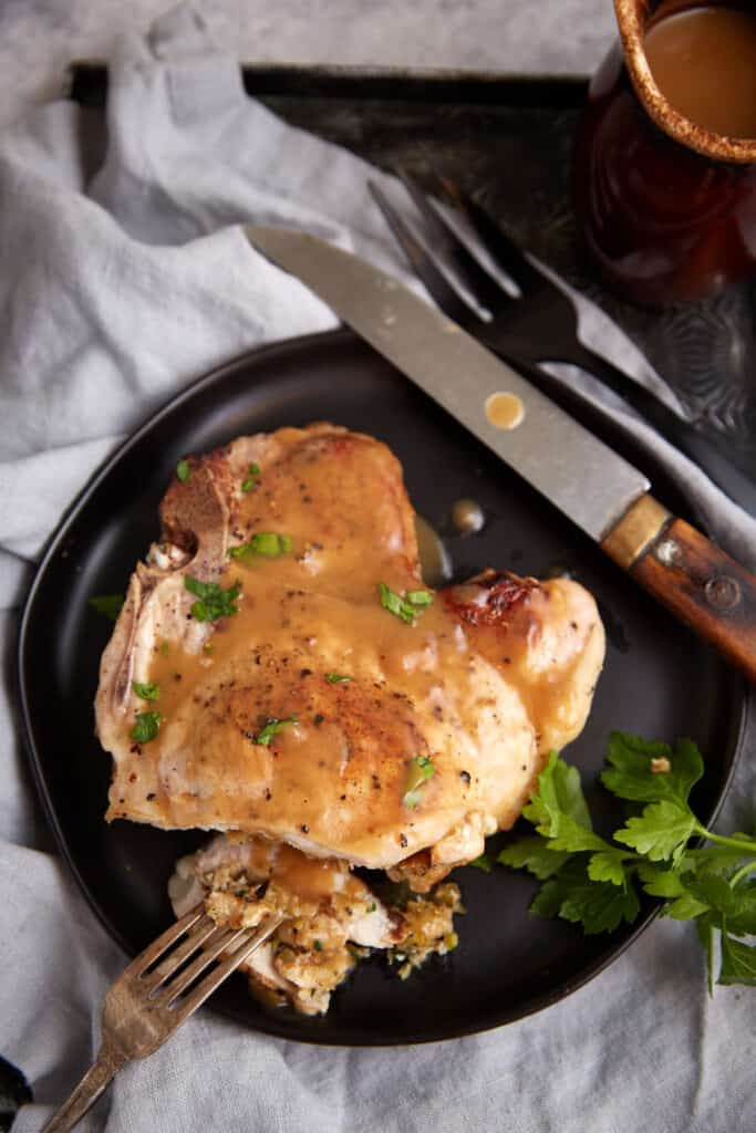 Juicy and Tender Stuffed Pork Chops With Herbed Stuffing and Gravy ...