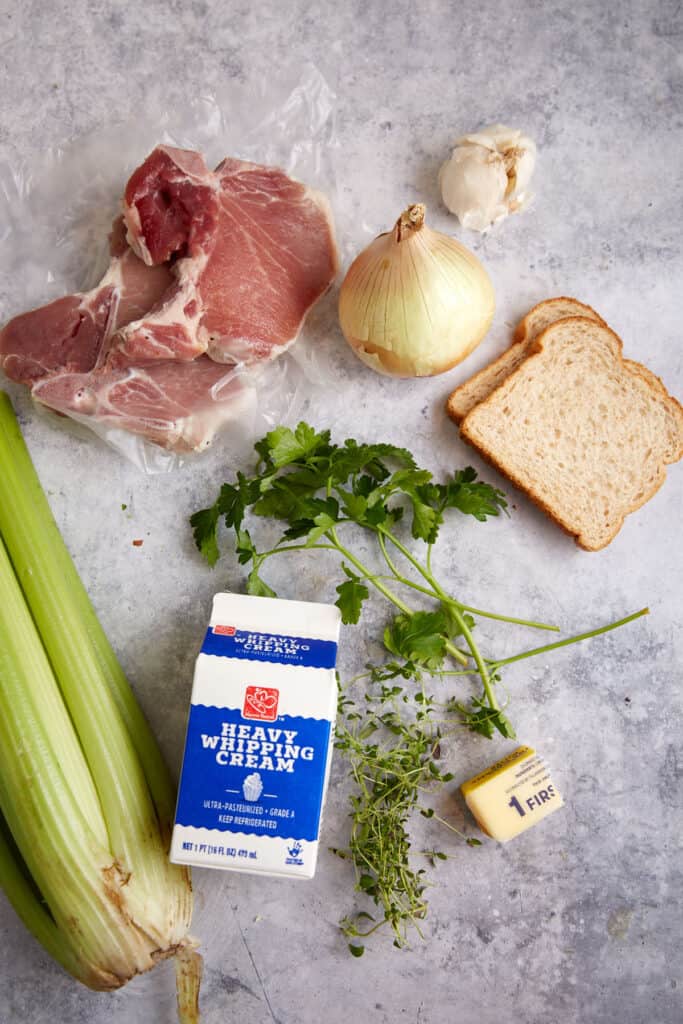 Juicy and Tender Stuffed Pork Chops With Herbed Stuffing and Gravy ...