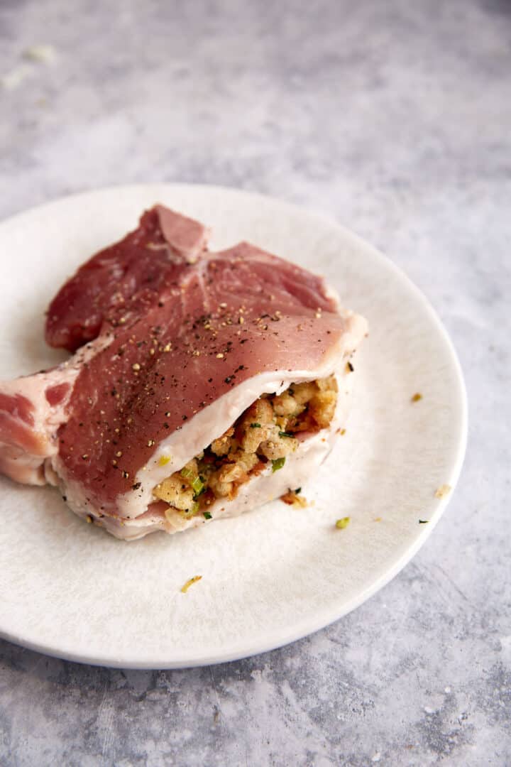 Juicy and Tender Stuffed Pork Chops With Herbed Stuffing and Gravy ...