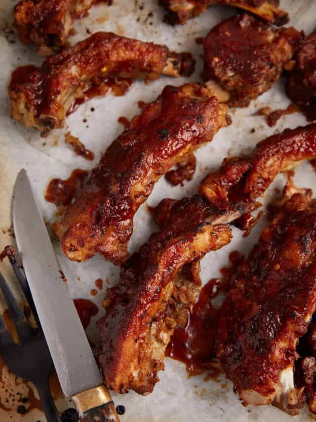 Tender and Juicy Oven Baked Pork Ribs - Butter & Baggage