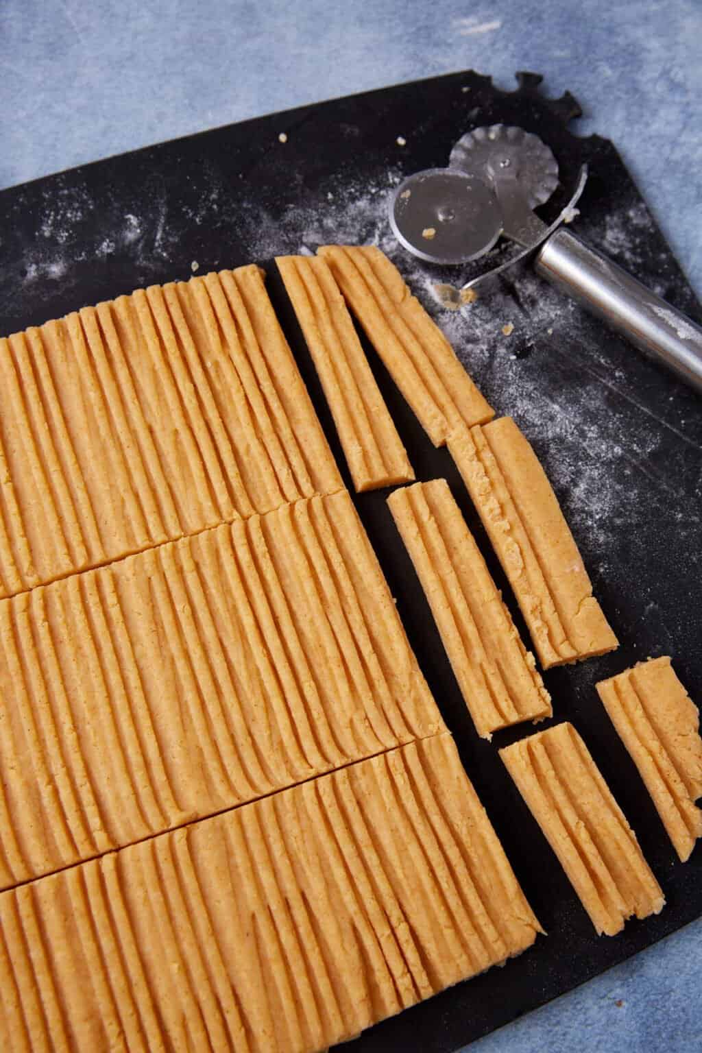 Southern Cheese Straws with Sharp Cheddar Cheese - Butter & Baggage