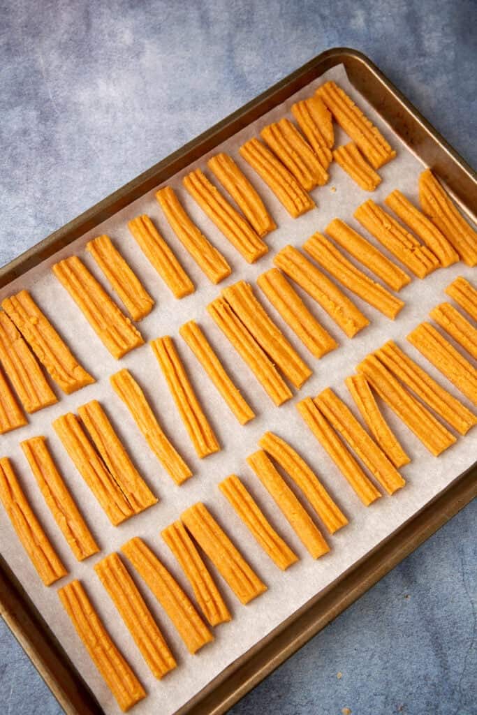 Southern Cheese Straws with Sharp Cheddar Cheese - Butter & Baggage