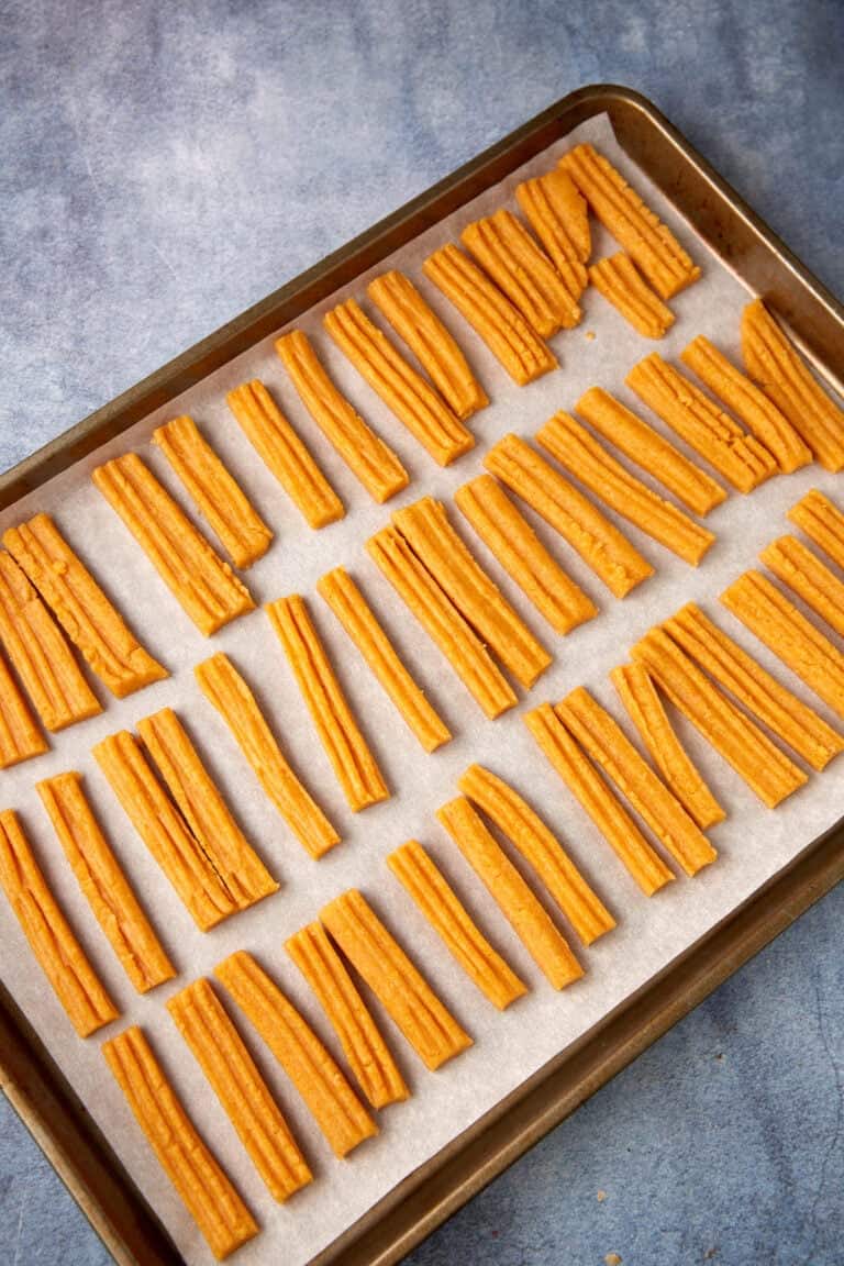 Southern Cheese Straws with Sharp Cheddar Cheese - Butter & Baggage